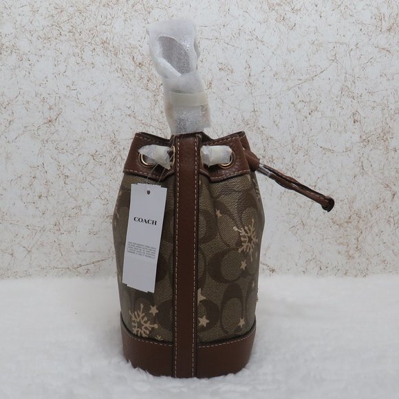 Coach | Bags | Coach Dempsey Star Snowflake Print Drawstring Bucket Bag ...